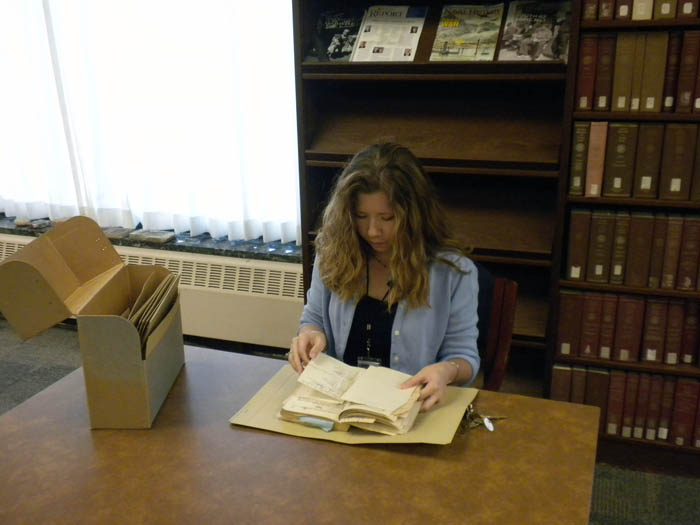 Tammy Kelly processing the records of Bess Truman. – Annotation